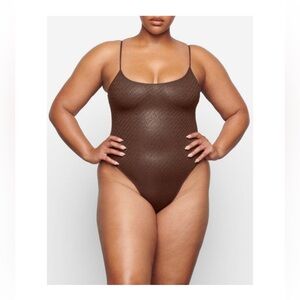 SKIMS | Tops | Skims Sheer Shimmer Logo Bodysuit In Coffee | Poshmark